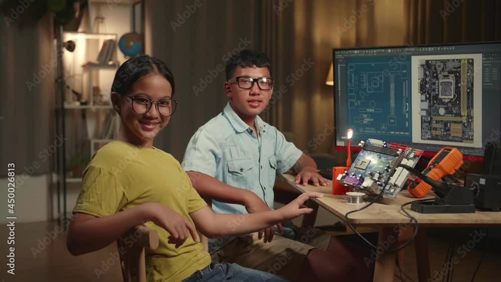 It Boy And Girl Are Working With Desktop Computer And Mainboard In Home ...