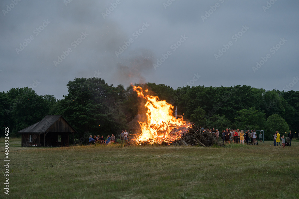 Midsummer traditional bonfire on tiny island Abruka in Baltic Sea ...