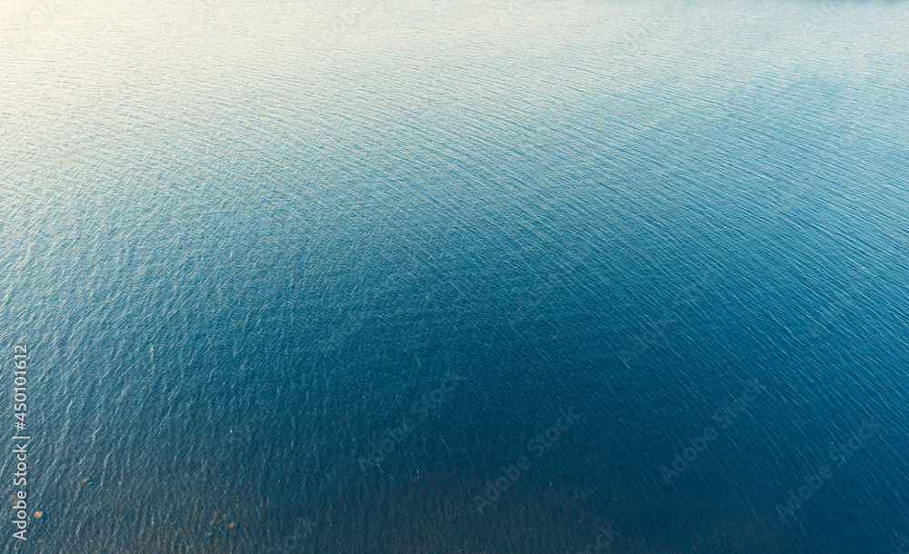 Aerial view of a crystal clear sea water texture. Top view from above ...