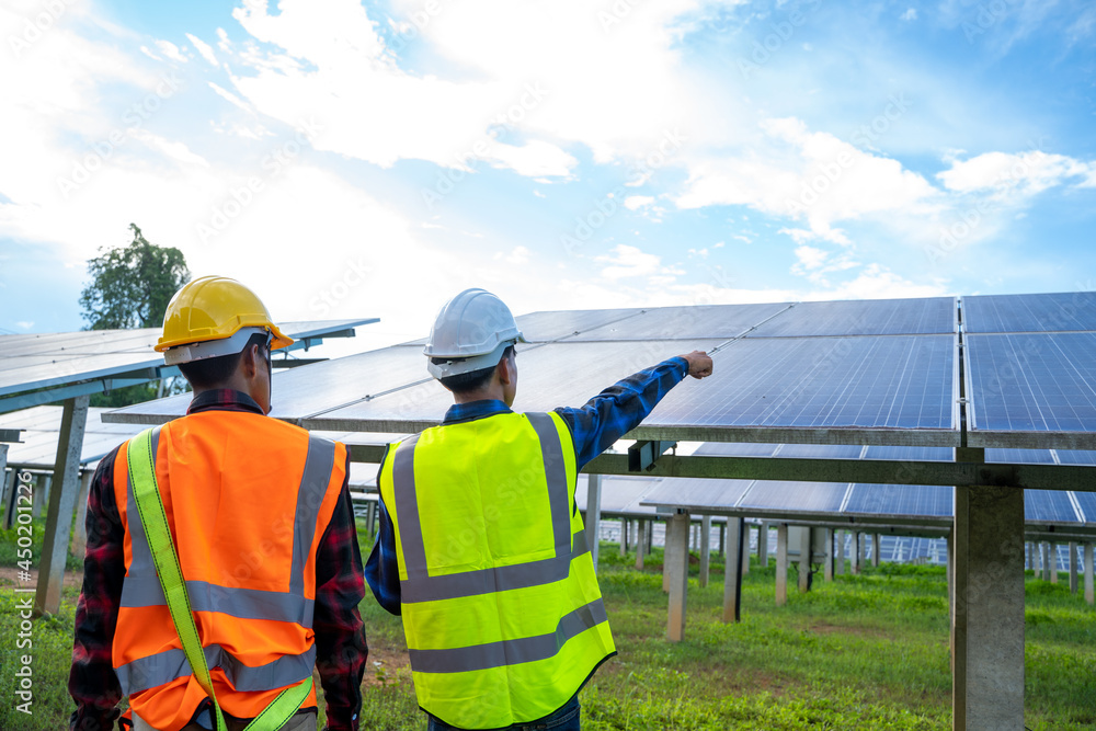 Professional worker working and installing solar panels,Innovative ...