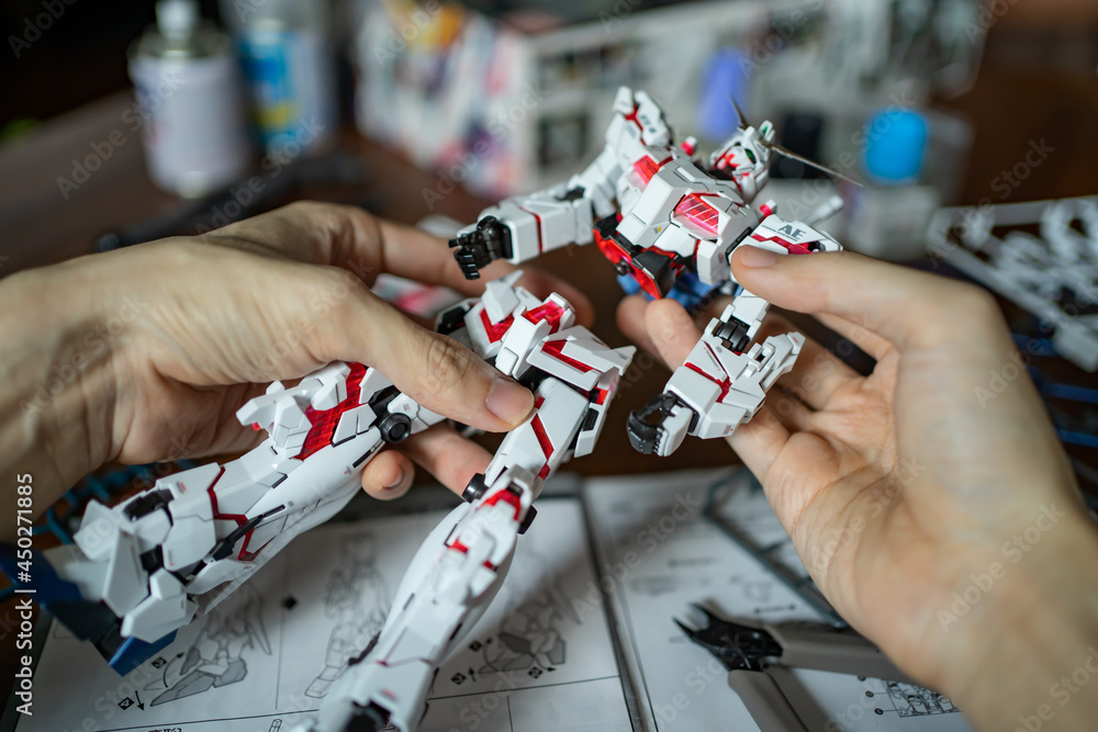 Bangkok, Thailand - August 10, 2021 : A man assembling the Unicorn ...