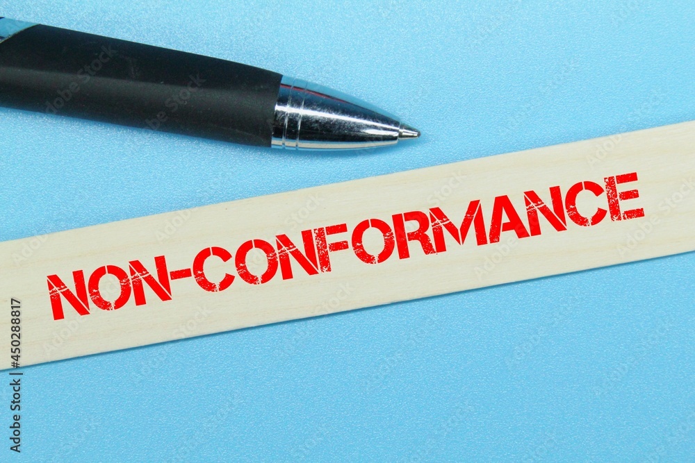 pen, a stick of colored ice cream with the word non-conformance Stock ...