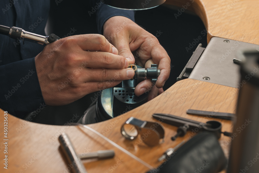 Goldsmith at work. Jeweler's workbenche with different tools. Desktop ...