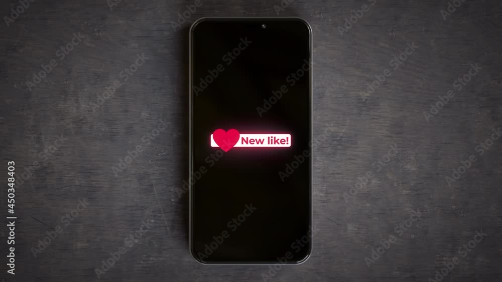 Smartphone on a desk showing new like social media notification 4k ...