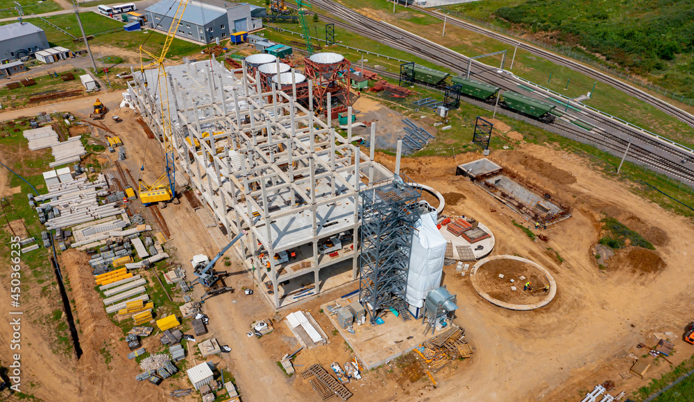 Huge construction site and structures of factory building. Modern ...