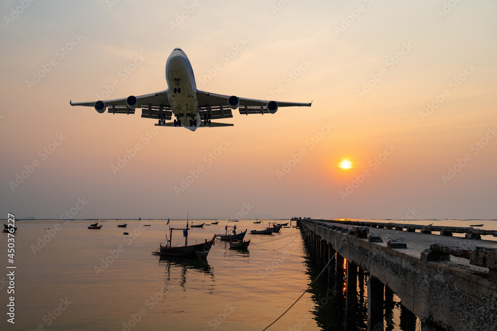 front image commercial passenger aircraft or cargo airplane fly over ...