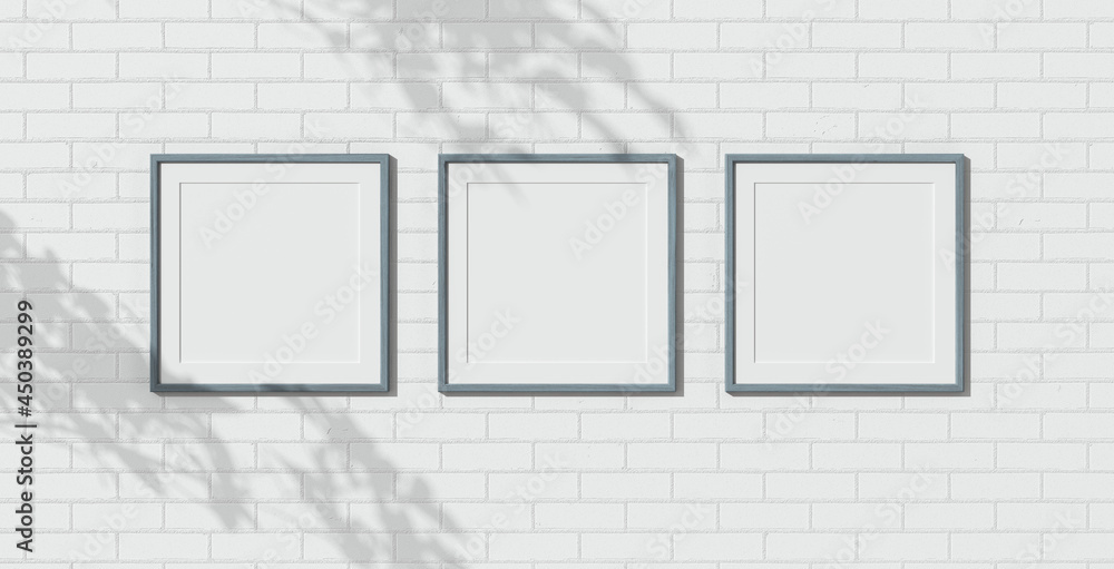 Three wooden frames on white brick wall. Triptych. 3D render wooden frame mock up. Empty ...