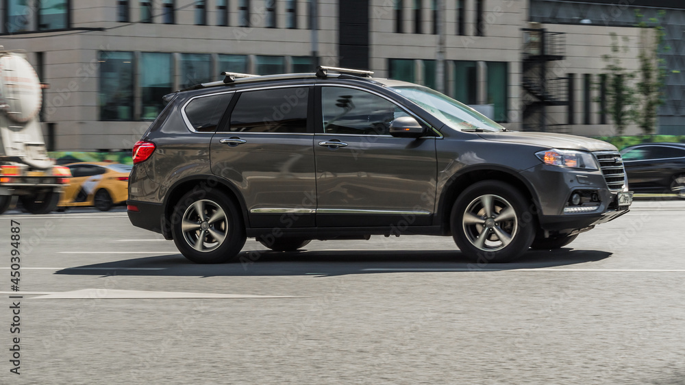 Haval H6 gray color driving fast motion on the highway, side view ...