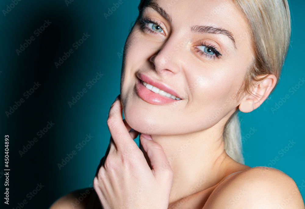 Perfect shiny smile. A happy laughing young woman with perfect skin ...