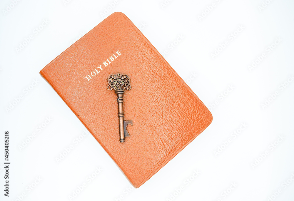 Key on bible on white background. Bible is key of success life, unlock ...