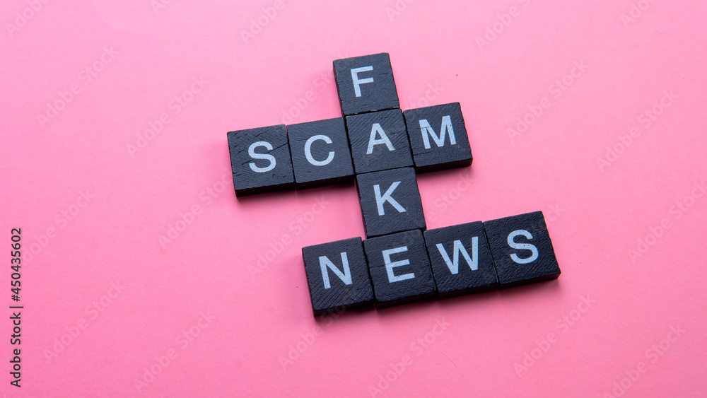word scam fake news. Stock Photo | Adobe Stock