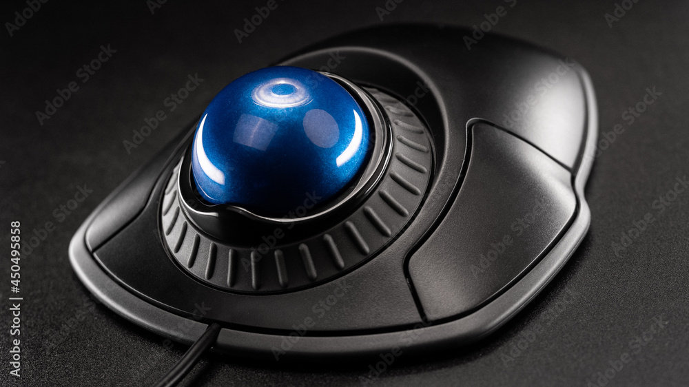 Trackball Computer Mouse on a black background. Control Device with ...