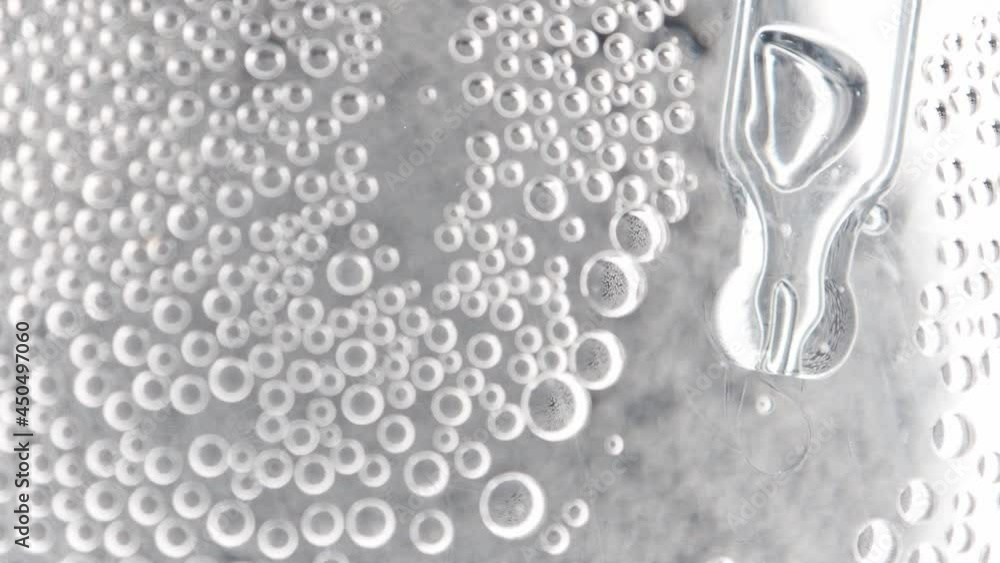 Oxygen bubbles in clear transparent water with hyaluronic acid or ...
