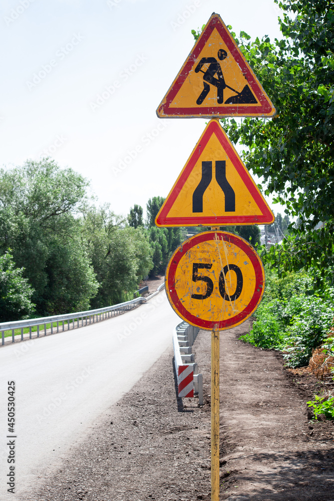 Close-up of old orange peeling sign in very rough condition. Speed ...