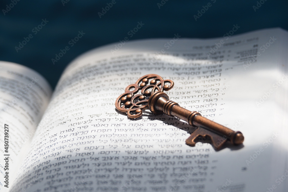 Key on Hebrew bible page. Concept Israel is the key of salvation ...