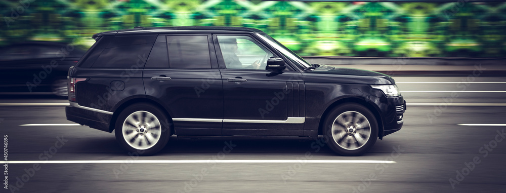Outdoor photo of Range Rover L405 on the street. Black premium SUV in ...