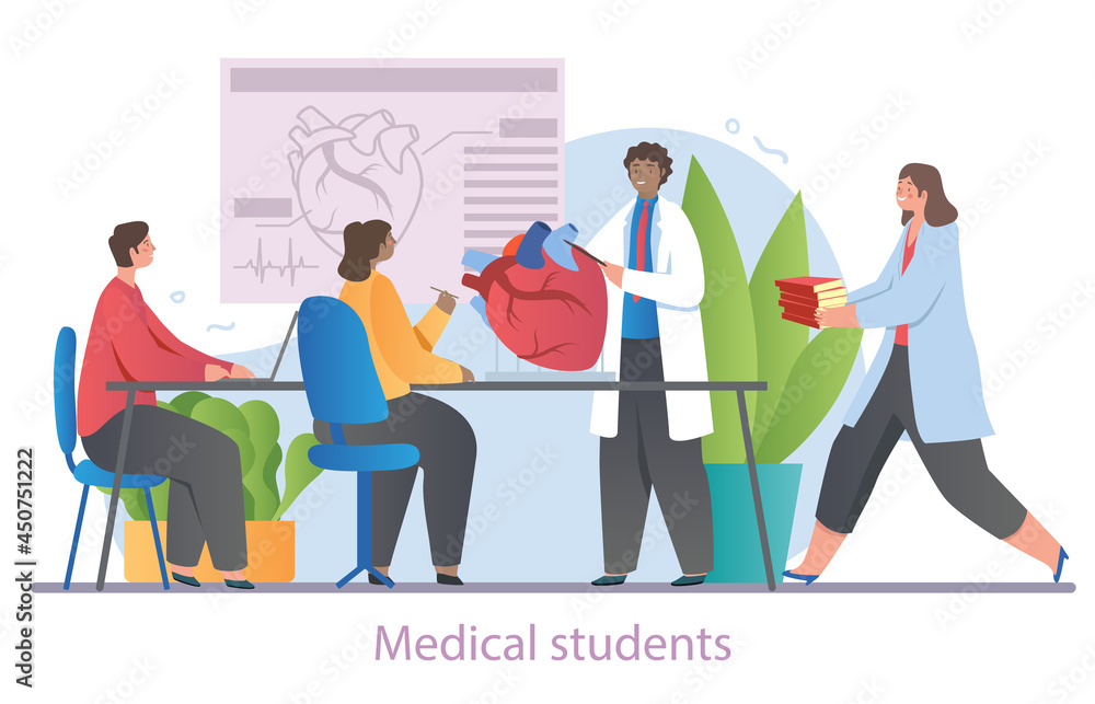 Young male and female medical students are studying together in lab on ...