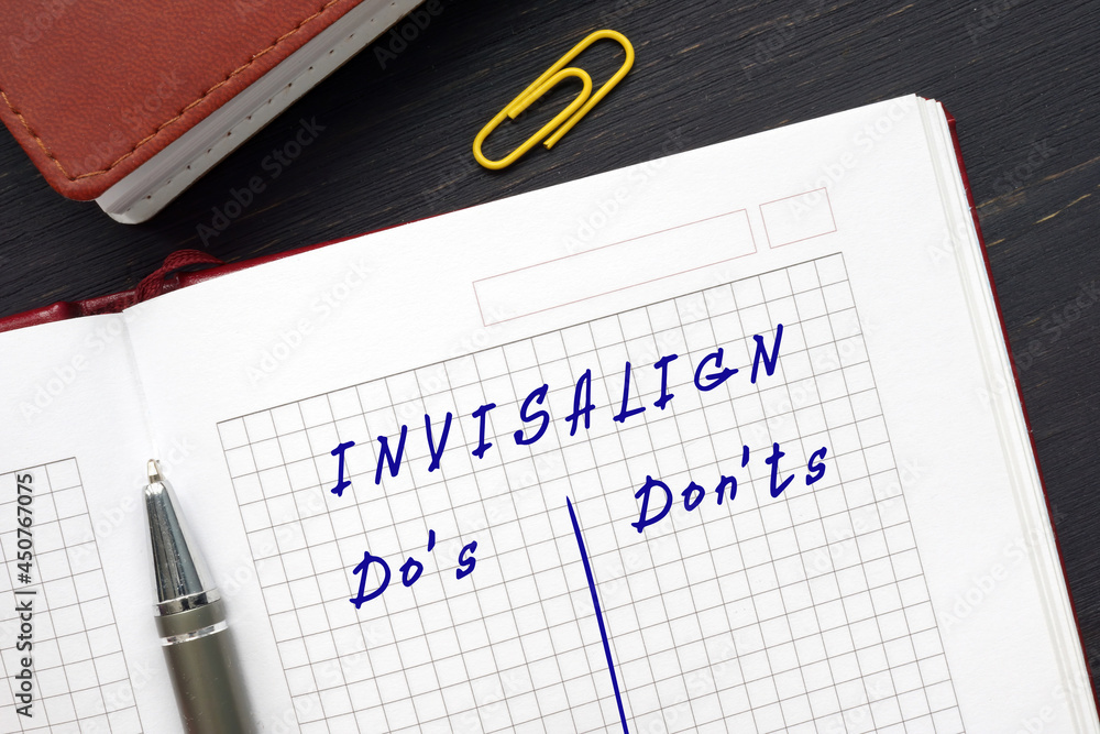 INVISALIGN Do's and Don'ts sign on the sheet. Stock Photo | Adobe Stock