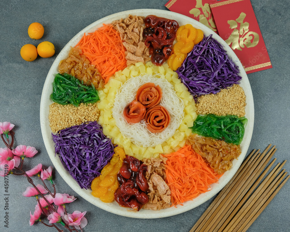 Chinese style raw fish salad. Lo Hei aka Prosperity Toss. Smoked salmon ...