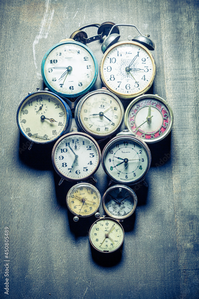 Mix of old clocks in pile. Parts of the clock. Stock Photo | Adobe Stock