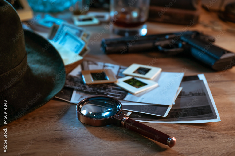 Private detective's desk, noir still life with a vintage phone ...