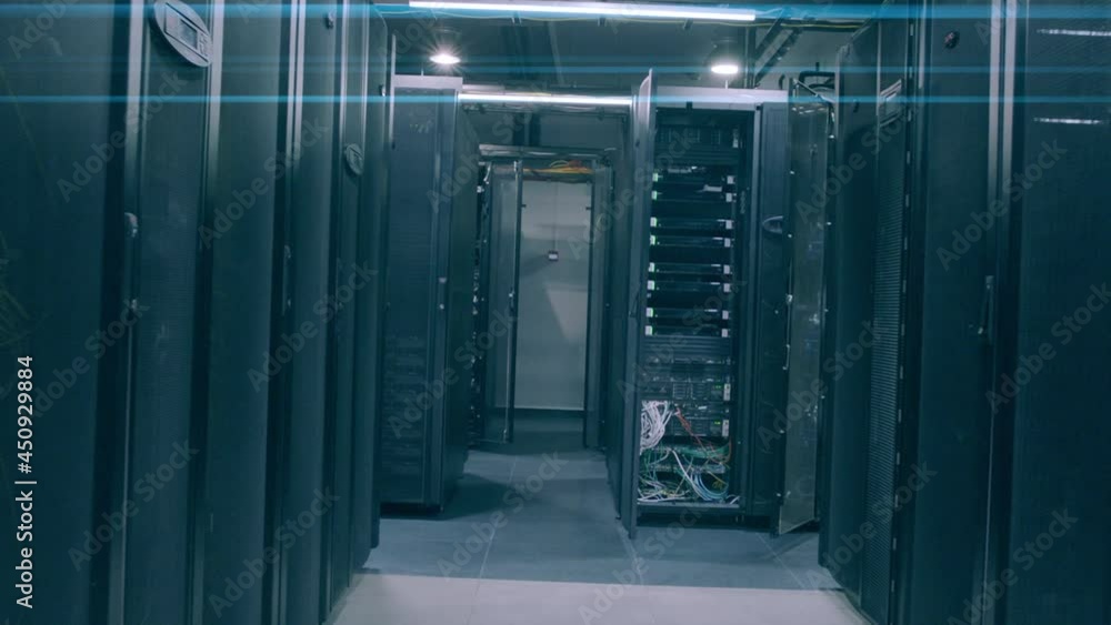 Camera moves through big working data center with server racks . Real ...