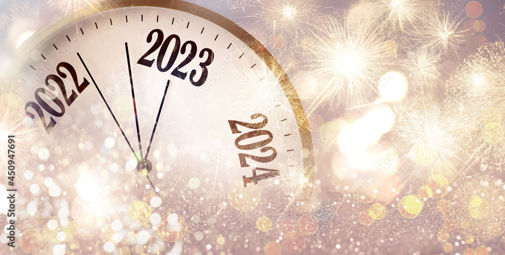 Clock counting last moments to New 2023 Year and beautiful fireworks on ...