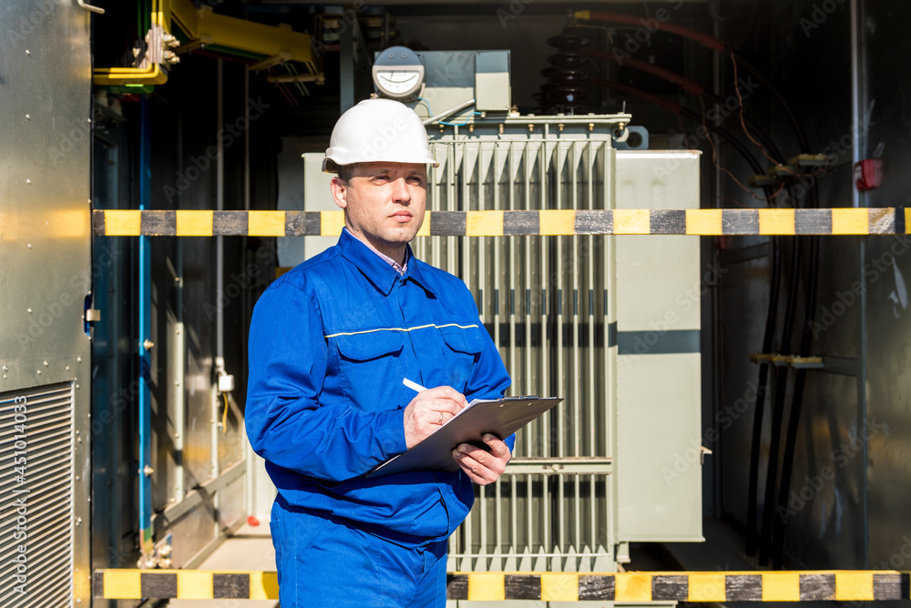 Execution of electrical measuring works on the power transformer Stock ...