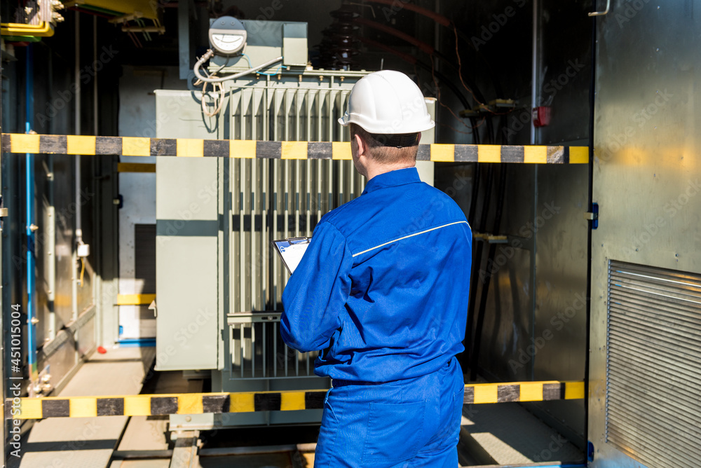 Execution of electrical measuring works on the power transformer Stock ...