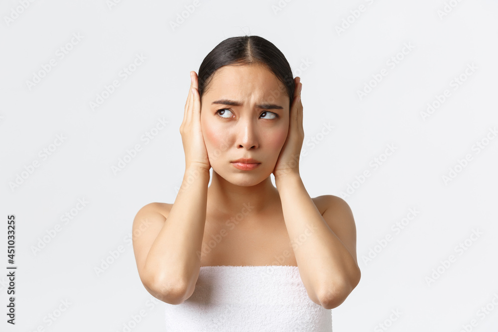 Beauty, cosmetology and spa salon concept. Bothered and disturbed young ...