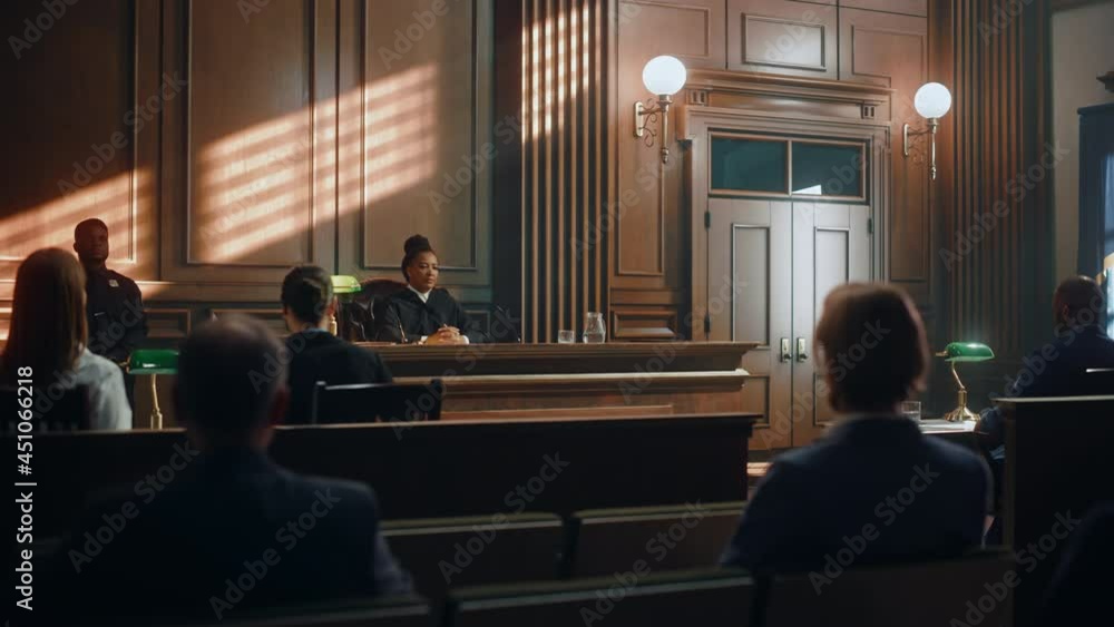 Court of Justice Trial: Impartial Judge Sitting Down, Public Sits Down ...