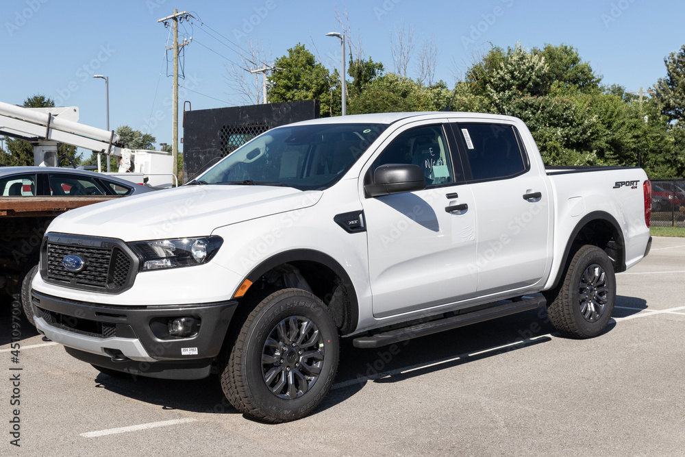 Ford Ranger pickup truck display at a dealership. The Ranger nameplate ...