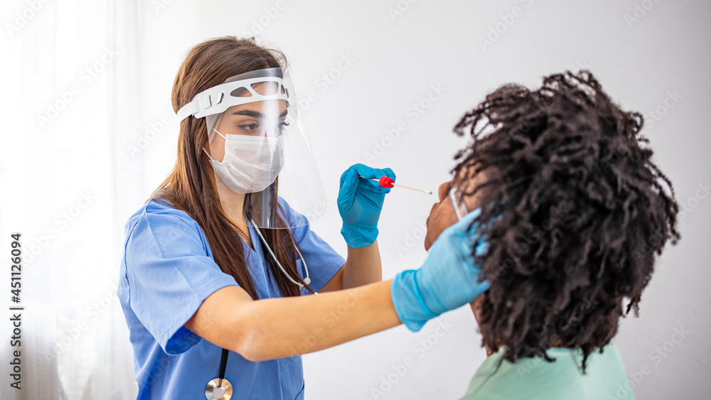 Close-up of healthcare worker taking PCR test at medical clinic. Close ...