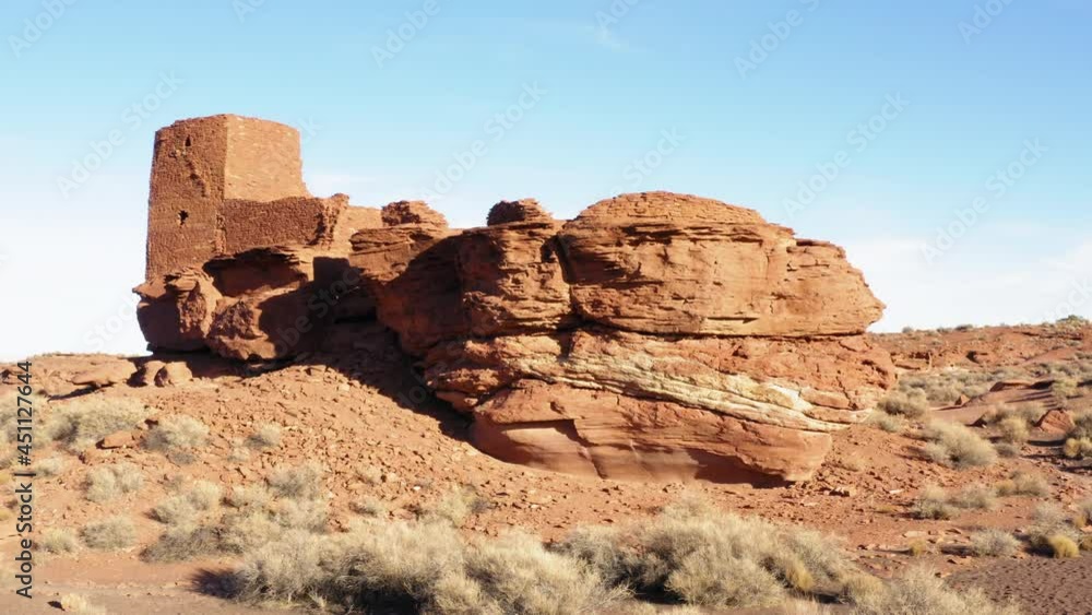 Parallax shot of ruined building built on sandstone rock formation ...