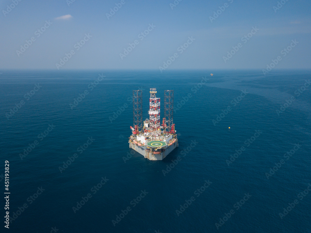Offshore drilling rig (jack up rig) and tow vessels during the rig move ...