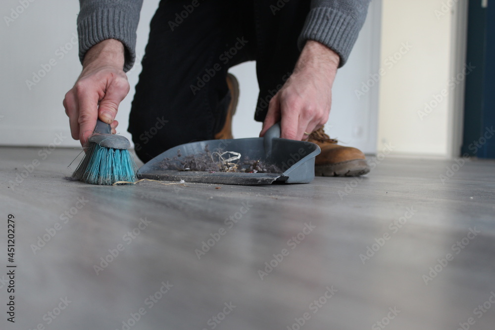 Man hands sweeping Dust with brush and dustpan, Housekeeping concept ...