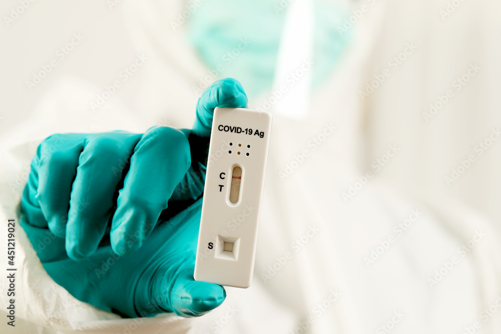Doctor with Covid-19 test kit from the lab at the hospital Stock Photo ...