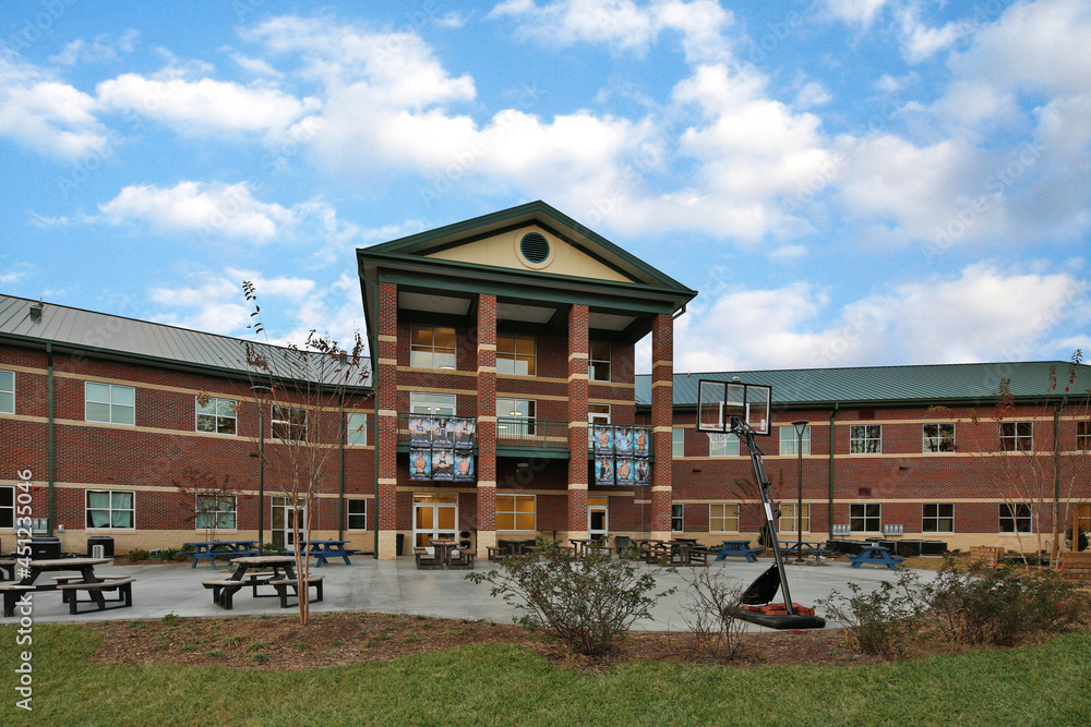 Modern brick college university campus building with pillars and ...