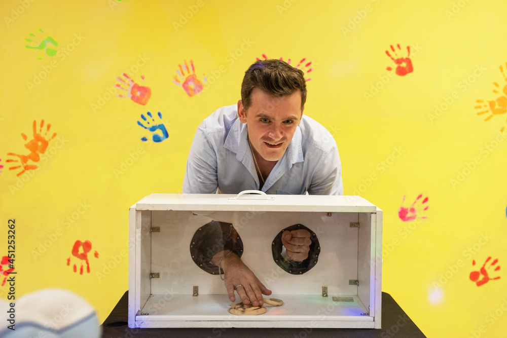 Blind guess game by touch . Man guesses by touch that he does not see ...