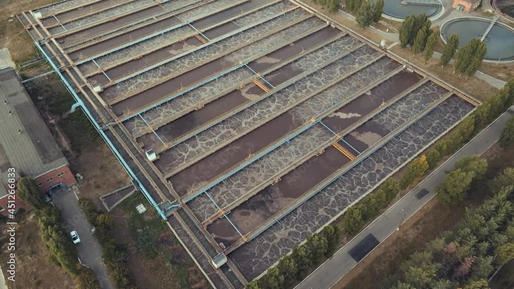 Sewage treatment plant. Grey water recycling. Waste management theme ...