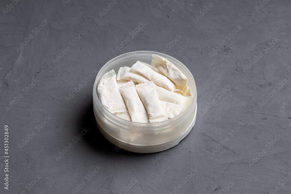 snus nicotine pouch product on concrete background. outer space ...