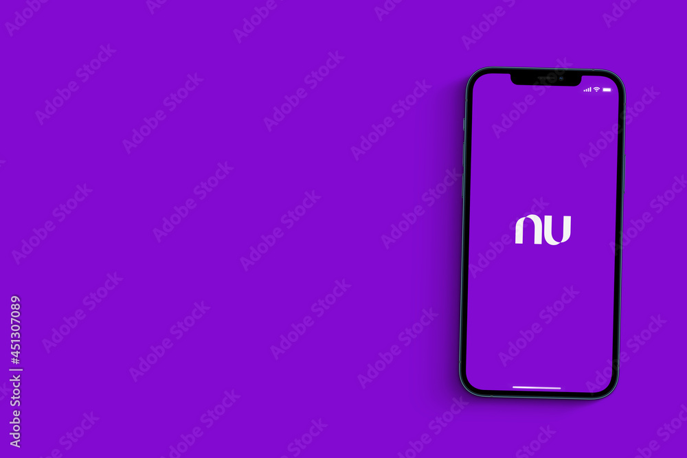 Nubank app on the smartphone screen on purple background. Brazilian ...