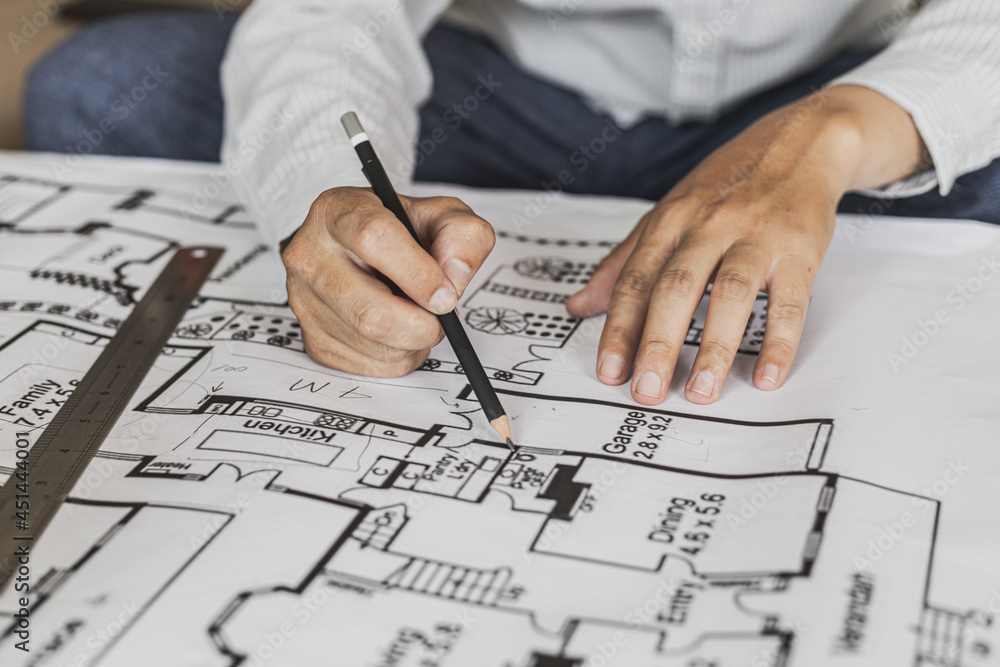 Architects write on the blueprints of the designed houses, designing ...