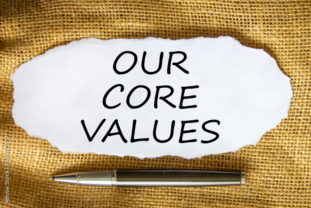 Our core values symbol. Words 'Our core values' on white paper. Black ...