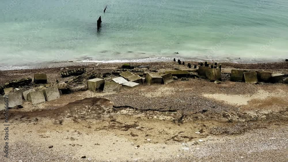 Climping Beach footage of storm damage with the old sea defence damaged ...
