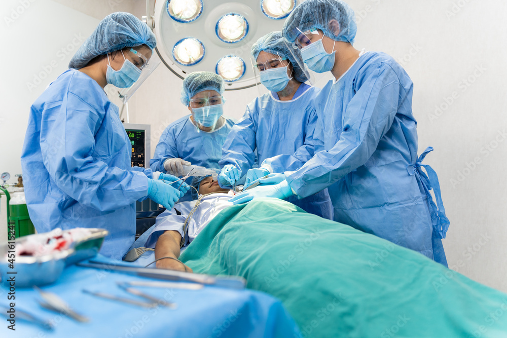 Medical Team Performing Surgical Operation in hospital operating ...