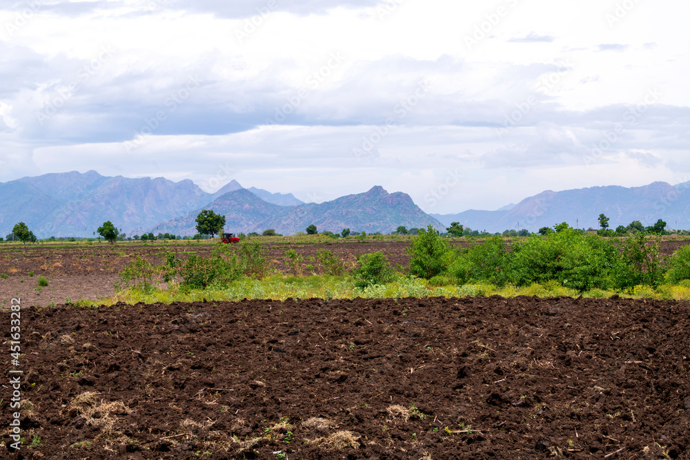 Empty agriculture land , Plowed field, fertile, black - brown soil ...