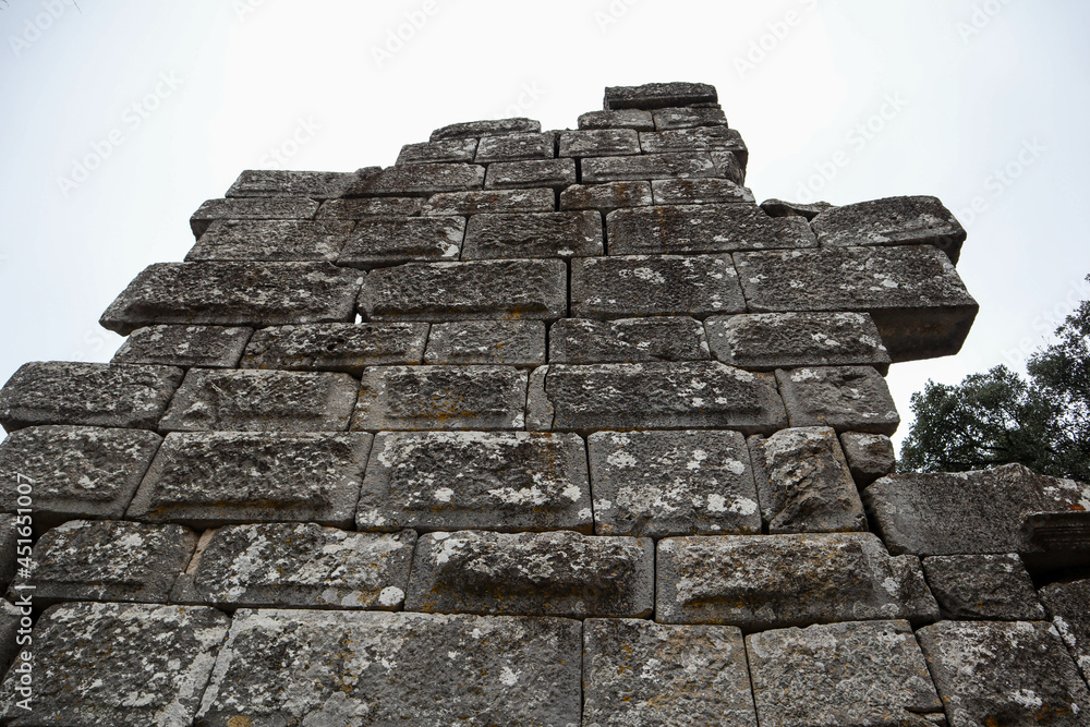 old ruined stone wall in ancient abandoned city Termessos lost in ...