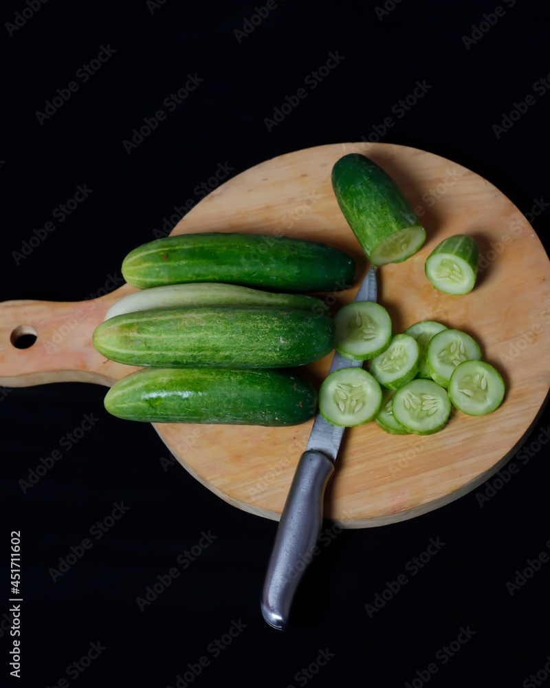 Fresh cucumber isolated on black background. Cucumber which has the ...