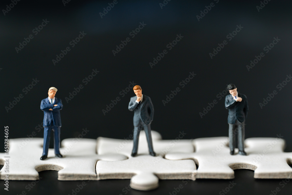 Miniature people Group Business man mini figures standing thinking on ...